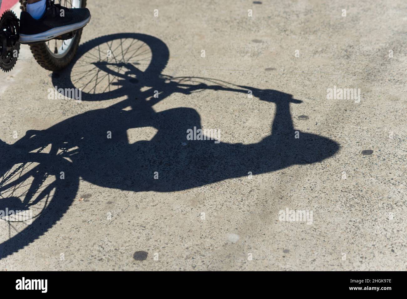 Shadow of a bicycle on the bike path in the city of Salvador, Brazil ...