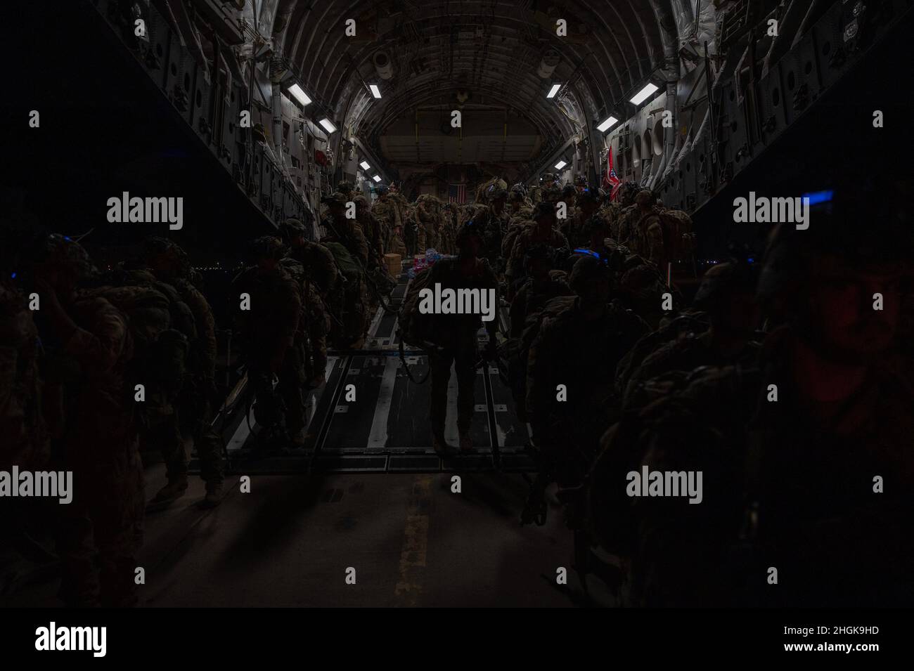 U.S. Soldiers, assigned to the 82nd Airborne Division, deplane a U.S ...