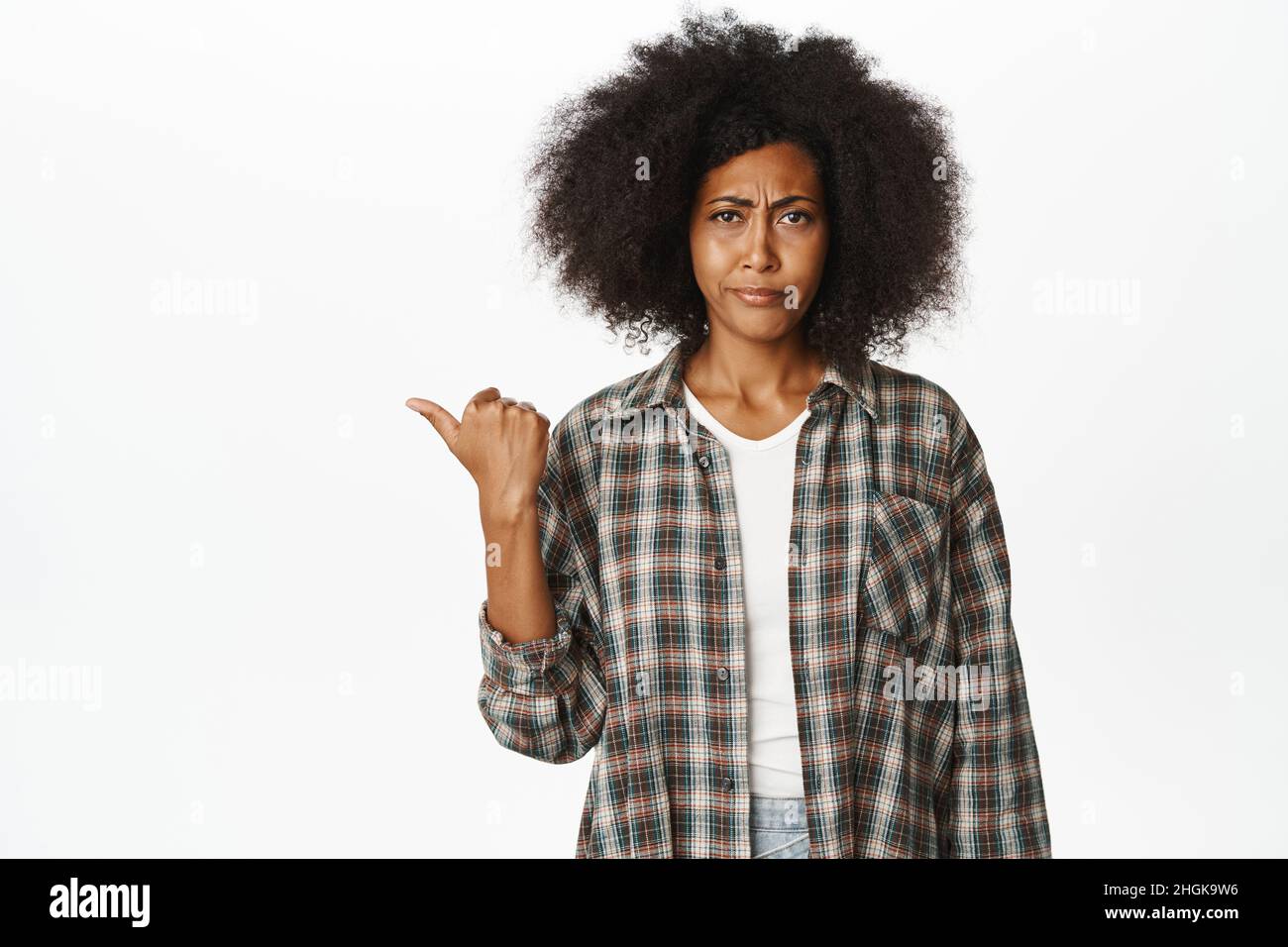 Skeptical african american female model, woman 30 years old frowning ...