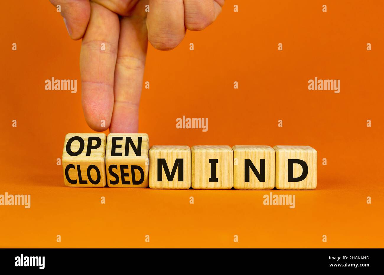 Open or closed mind symbol. Businessman turns cubes and changes concept ...