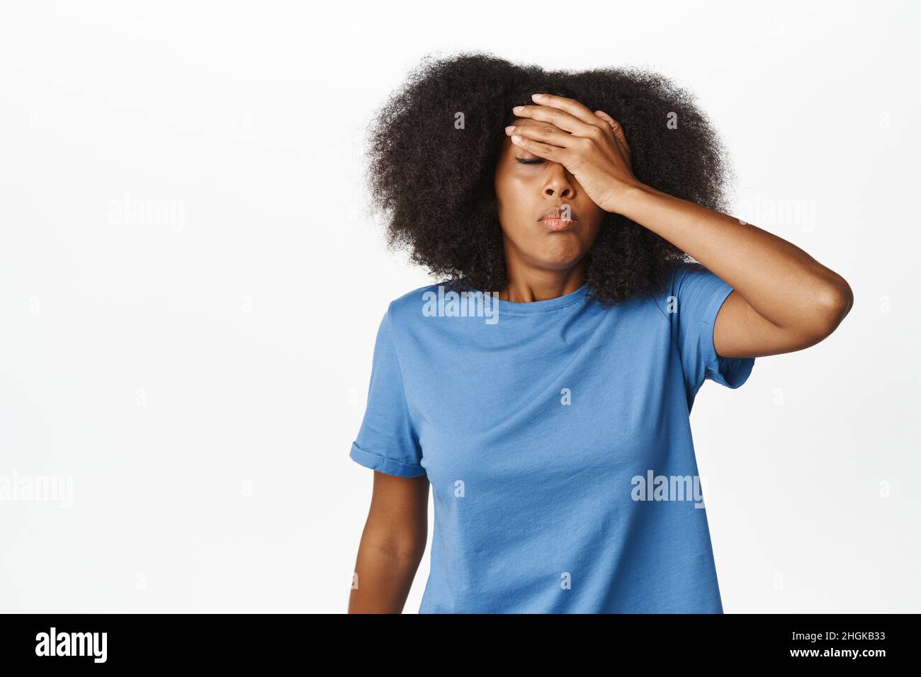 Embarrassed and distressed young african american woman facepalm ...