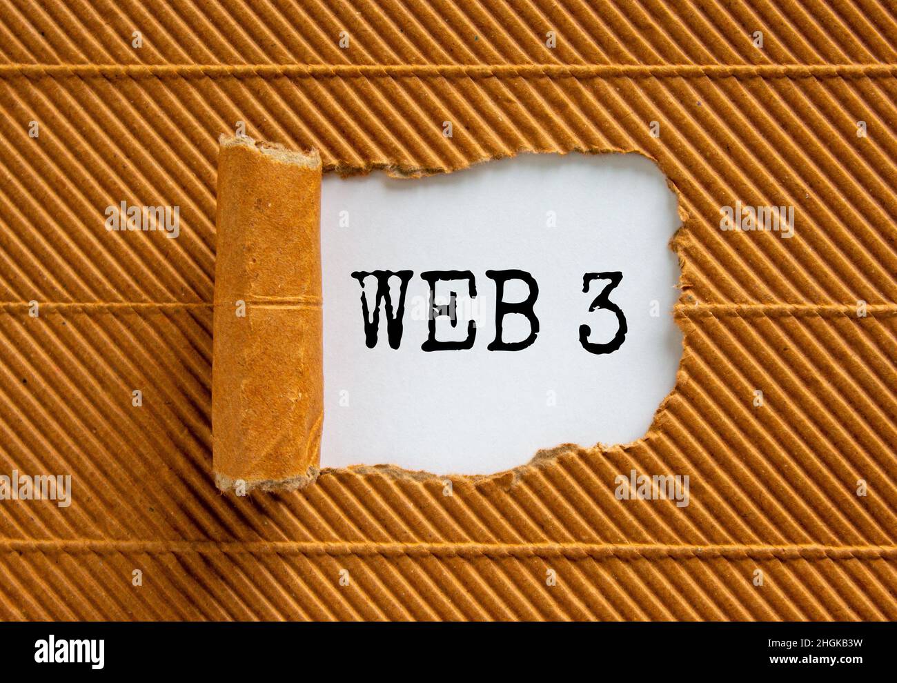 WEB 3 symbol. Concept words WEB 3 appearing behind torn brown paper ...