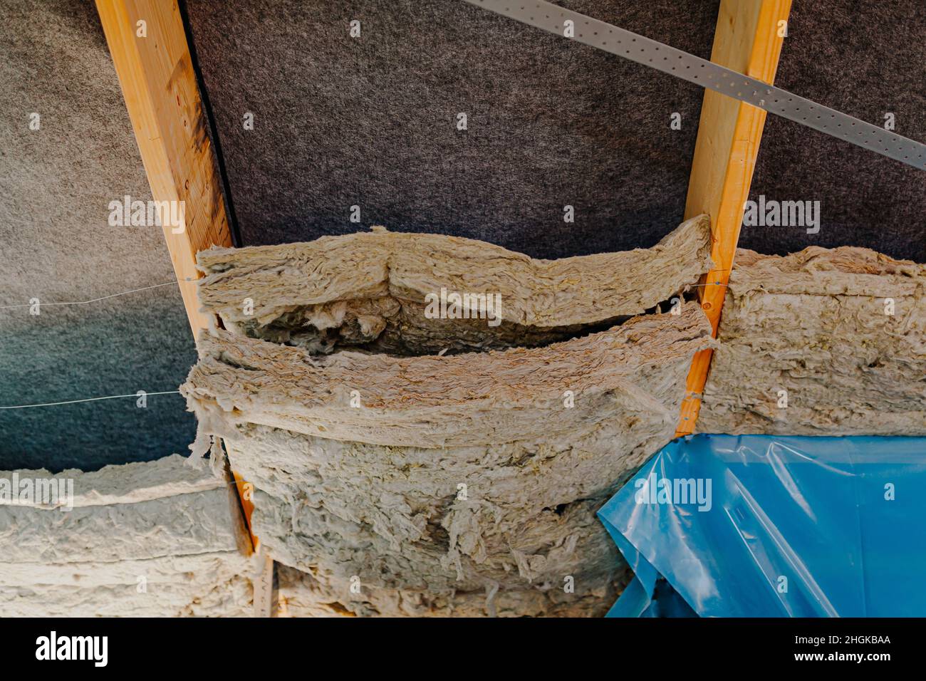 attic insulation with mineral wool Stock Photo - Alamy