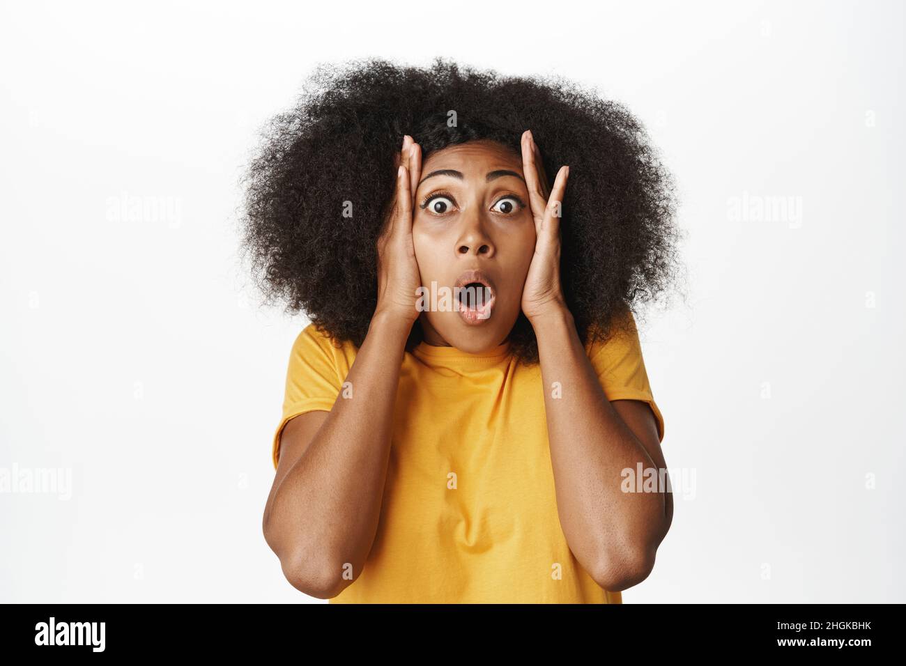 Close up portrait of scared and shocked Black woman gasping, looking ...