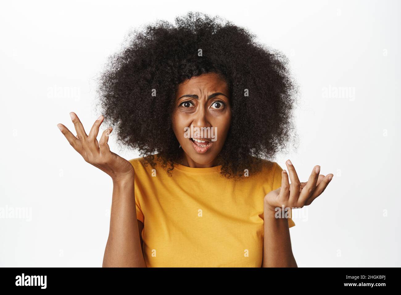Portrait of confused Black woman looking puzzled and annoyed, cant ...