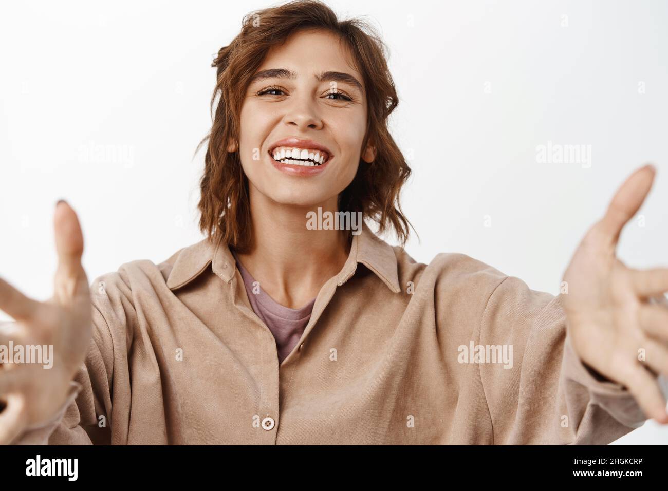Happy portrait young women reaching hi-res stock photography and images ...