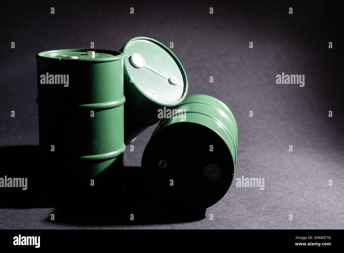 tin barrels on black background isolated close up, one round oil drum ...