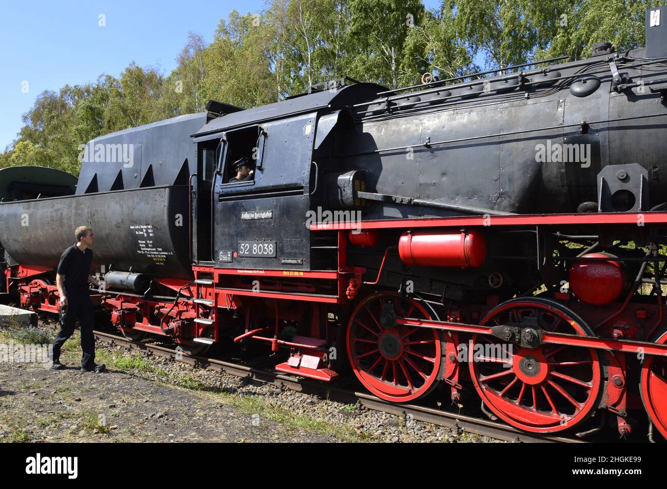 Maintenance work on a steam locomotive 528038 Stock Photo - Alamy