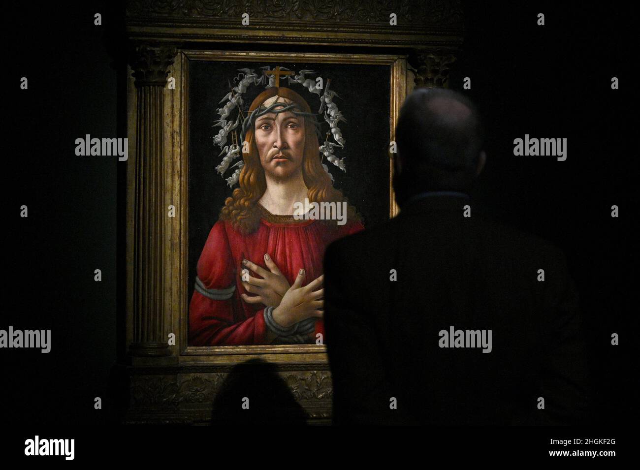 A visitor looks upon “The Man of Sorrows” painting by Italian ...