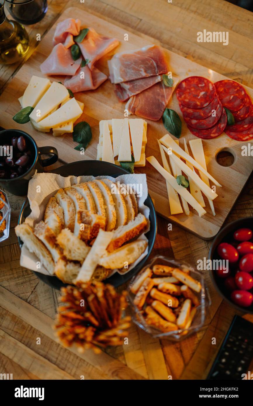 Table full of Tasty Salty Snacks Stock Photo - Alamy