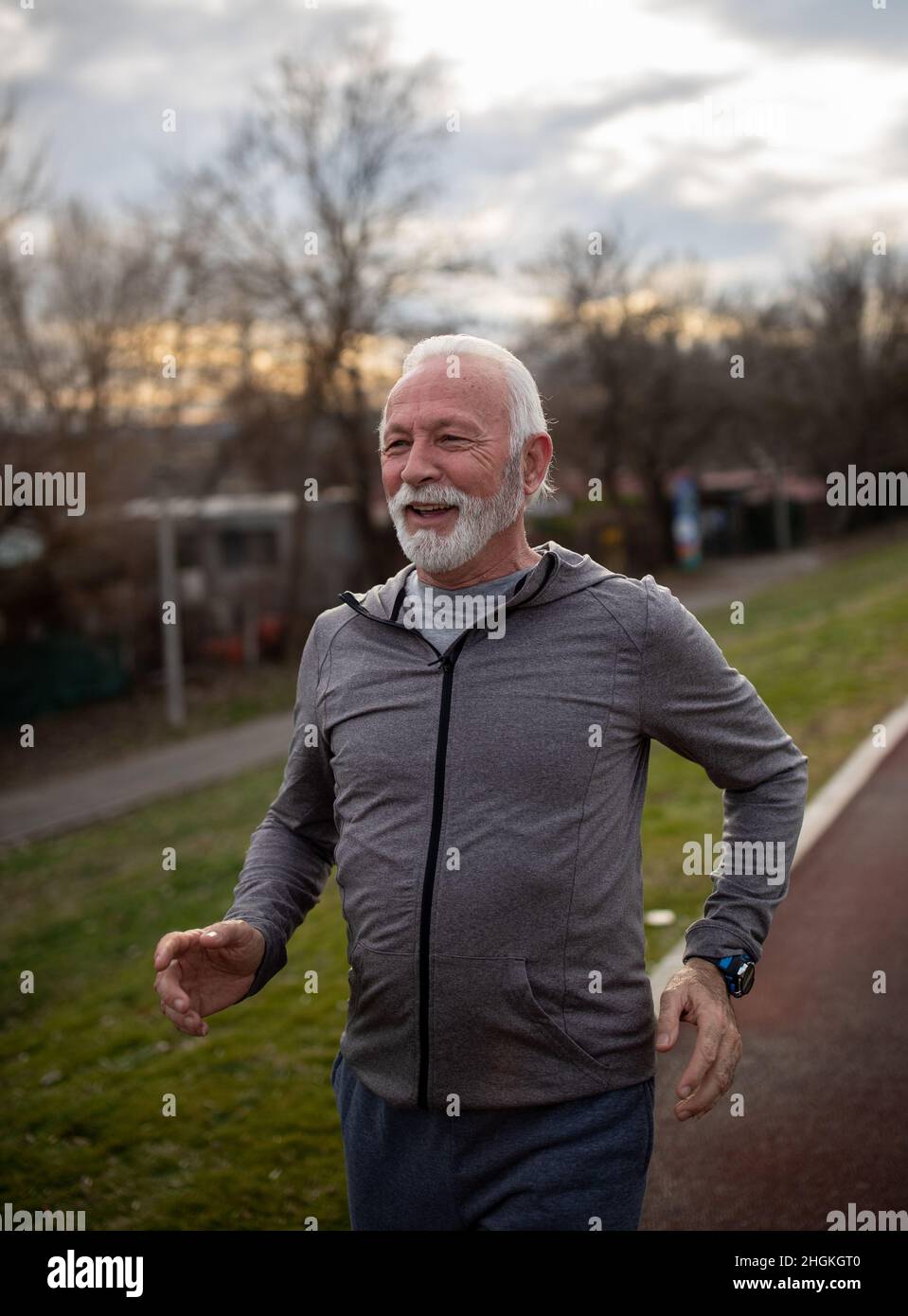 Running older male athlete hi-res stock photography and images - Alamy