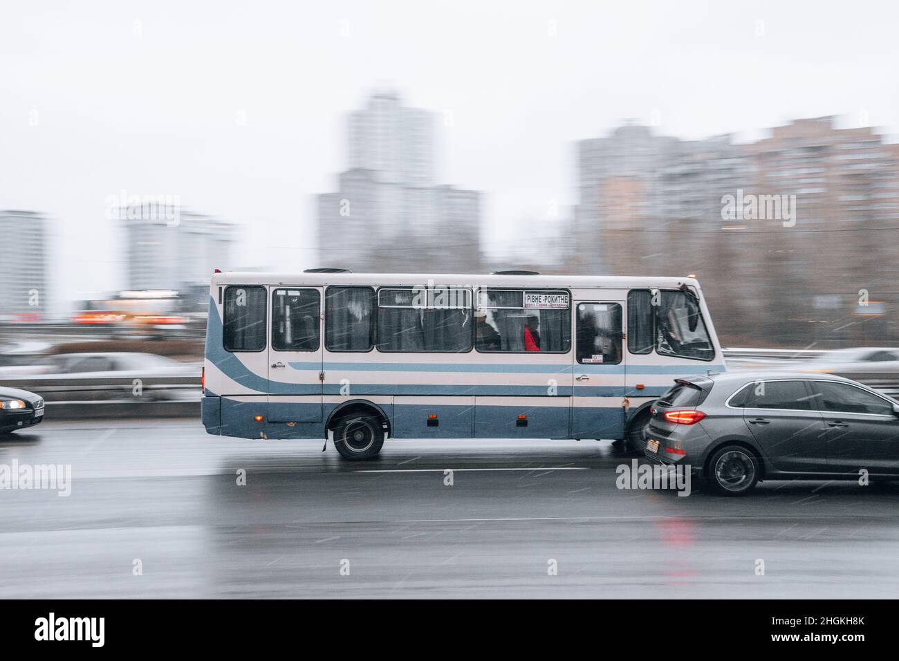 Ukraine, Kyiv - 15 January 2022: White public transport bus car moving ...