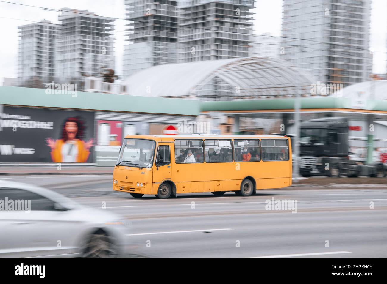 Ukraine, Kyiv - 15 January 2022: Yellow public transport bus car moving ...