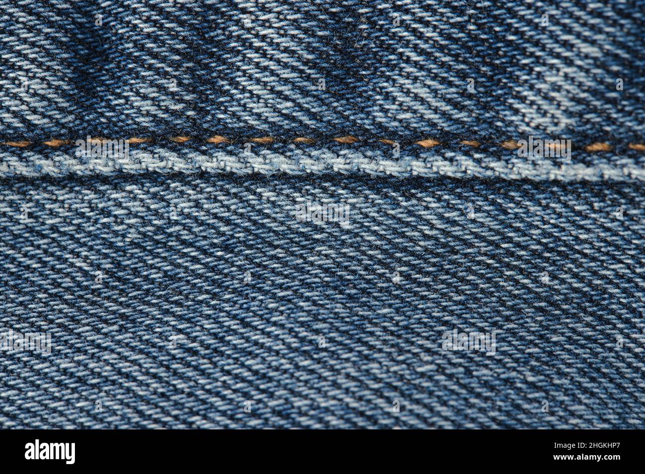 Seams on jeans close-up. Stitching on denim. Close up of blue jeans ...