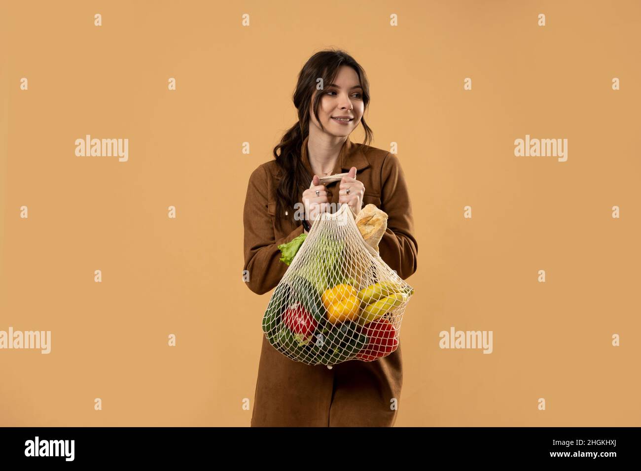 Zero waste, plastic free concept. Young brunette woman with cotton ...