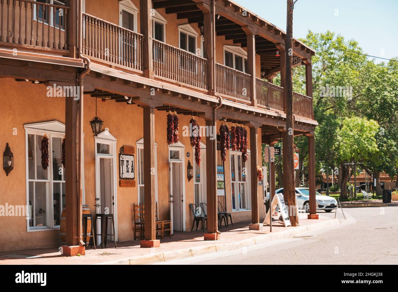 an historic building with wooden pillars and balcony in Albuquerque's ...
