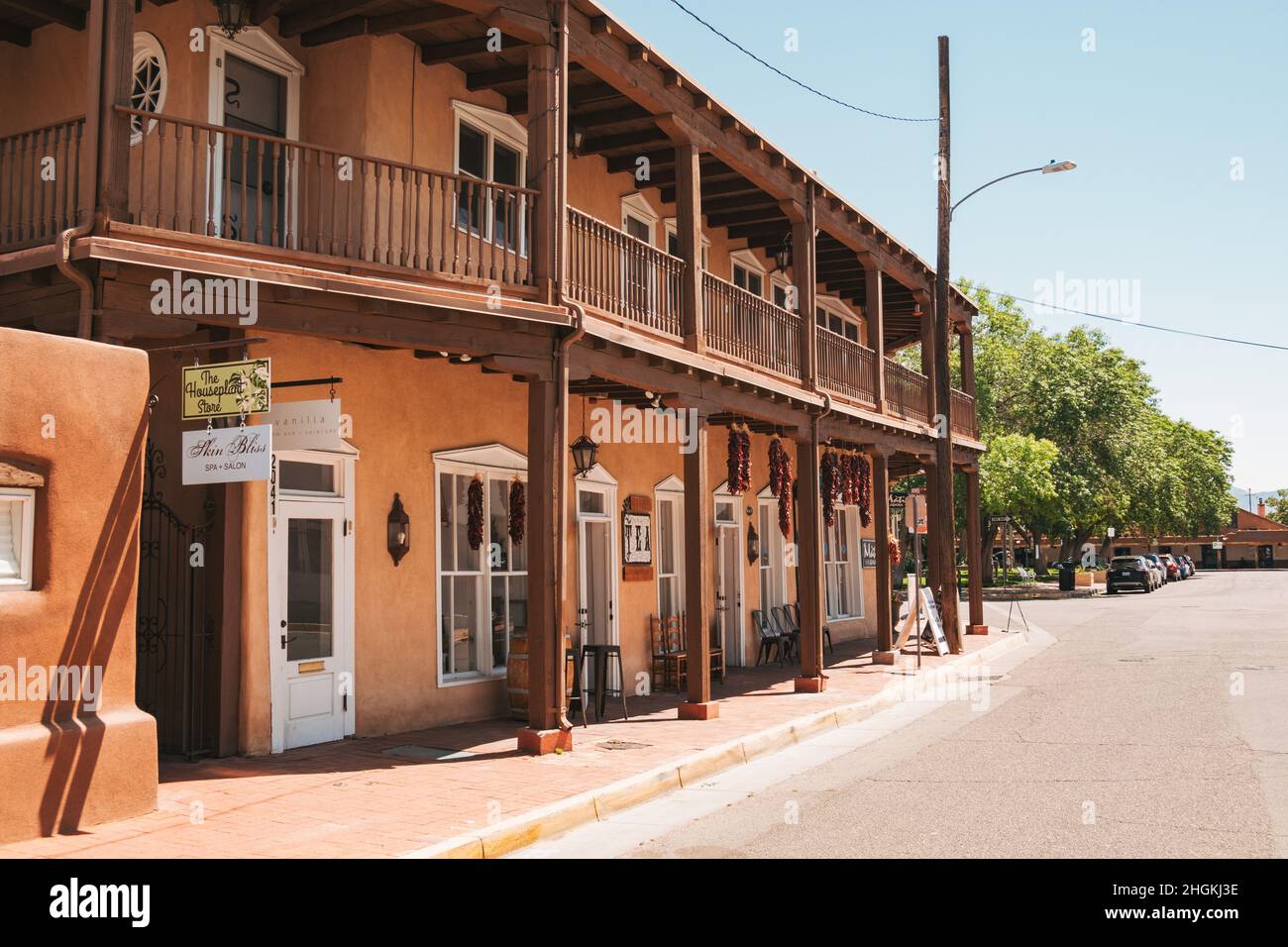 an historic building with wooden pillars and balcony in Albuquerque's ...