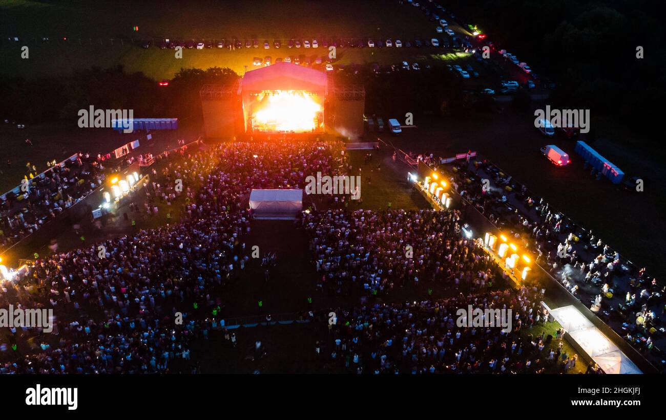open concert in the field at night Stock Photo - Alamy