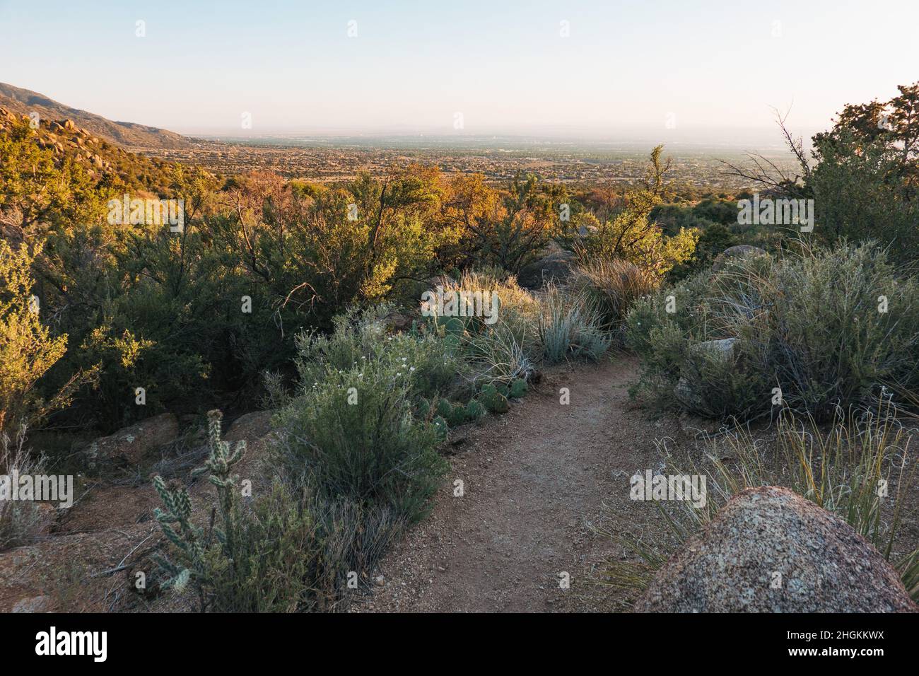 a hiking trail through the Sandia Mountains Wilderness, with the city ...