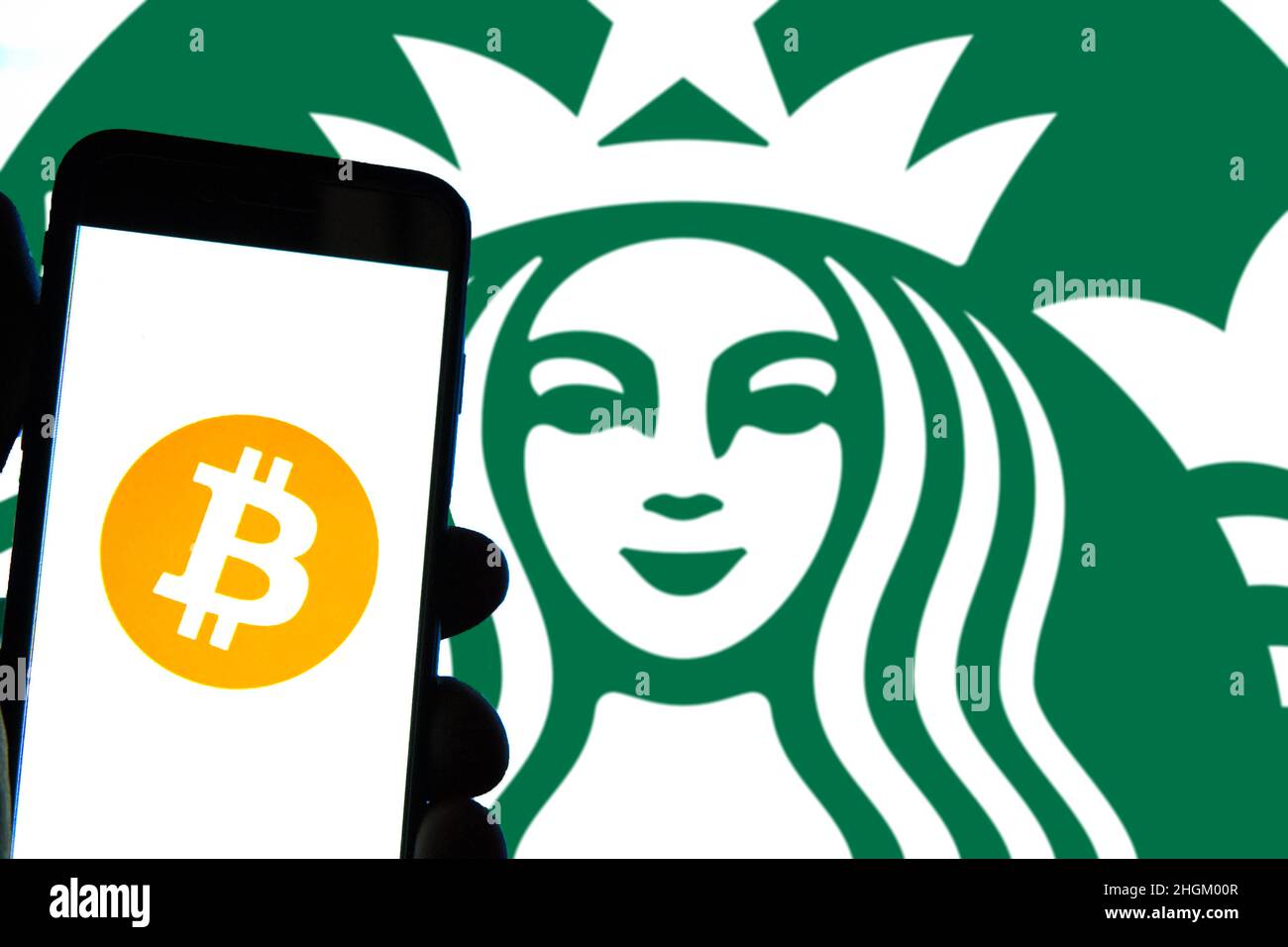 In this photo illustration a Bitcoin logo seen displayed on a ...
