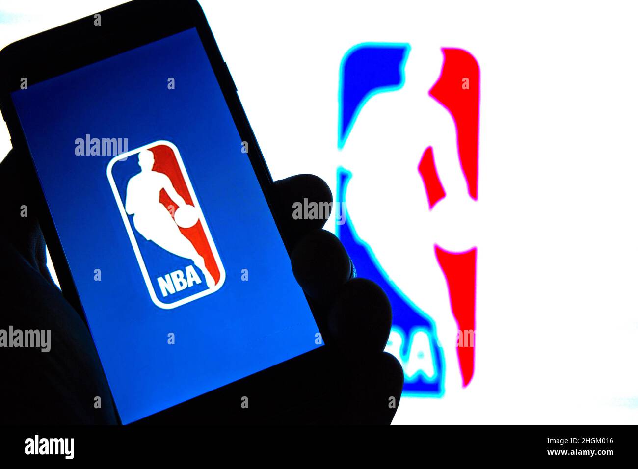 In this photo illustration a NBA logo seen displayed on a smartphone ...