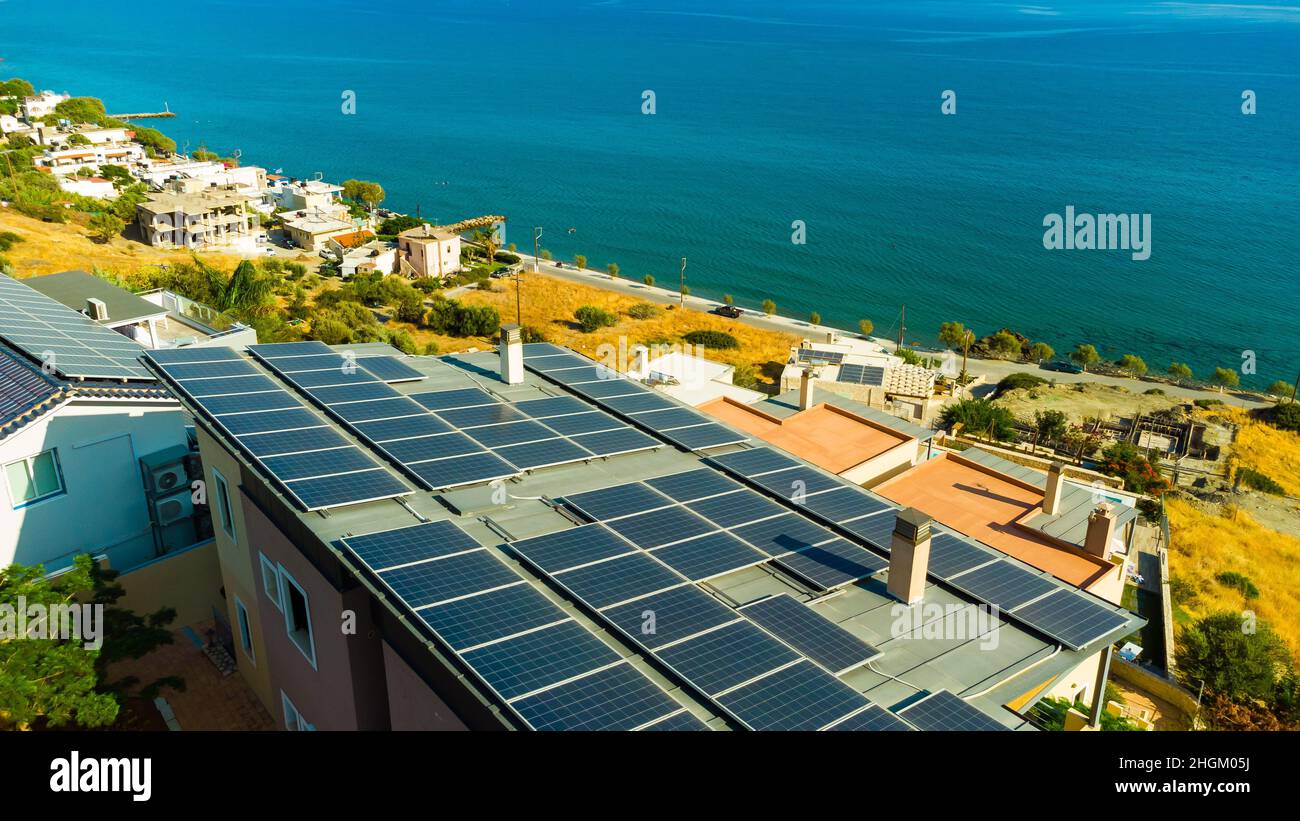 Large solar panel installation on roof Stock Photo - Alamy