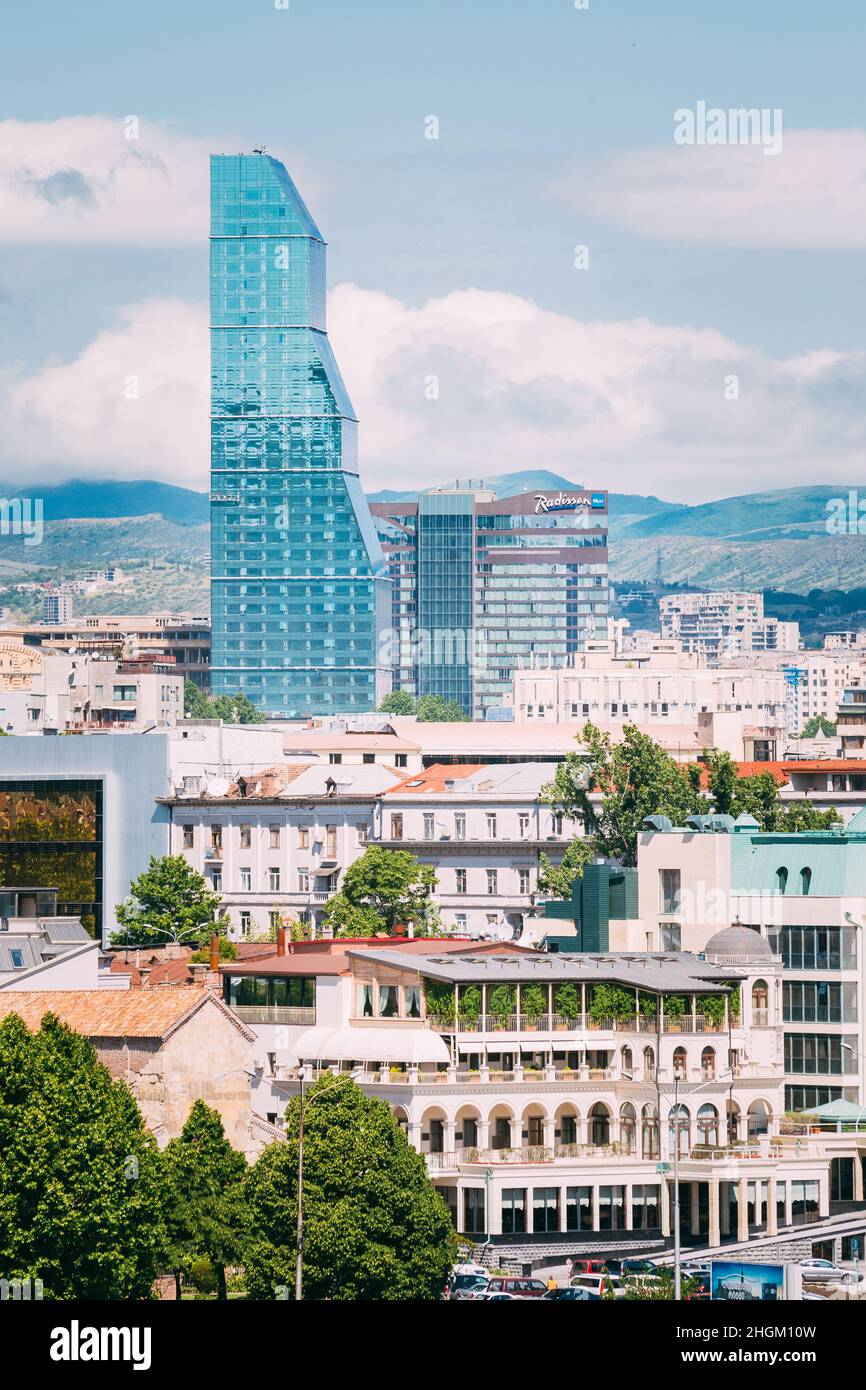 Radisson Blu Hotel On Background Of Urban Cityscape Of Tbilisi, Georgia ...
