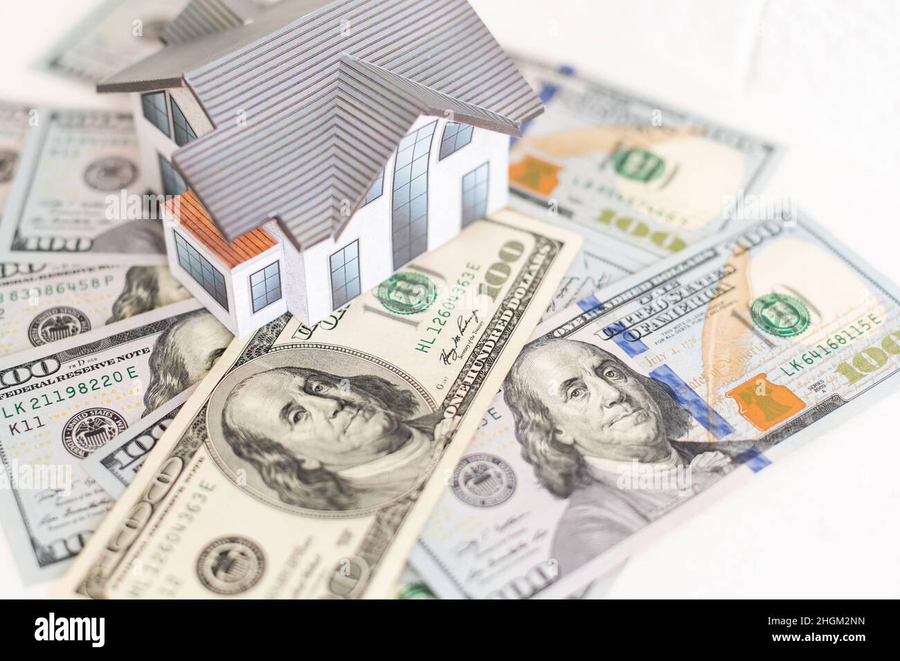 house layout and dollar bills on the background Stock Photo - Alamy