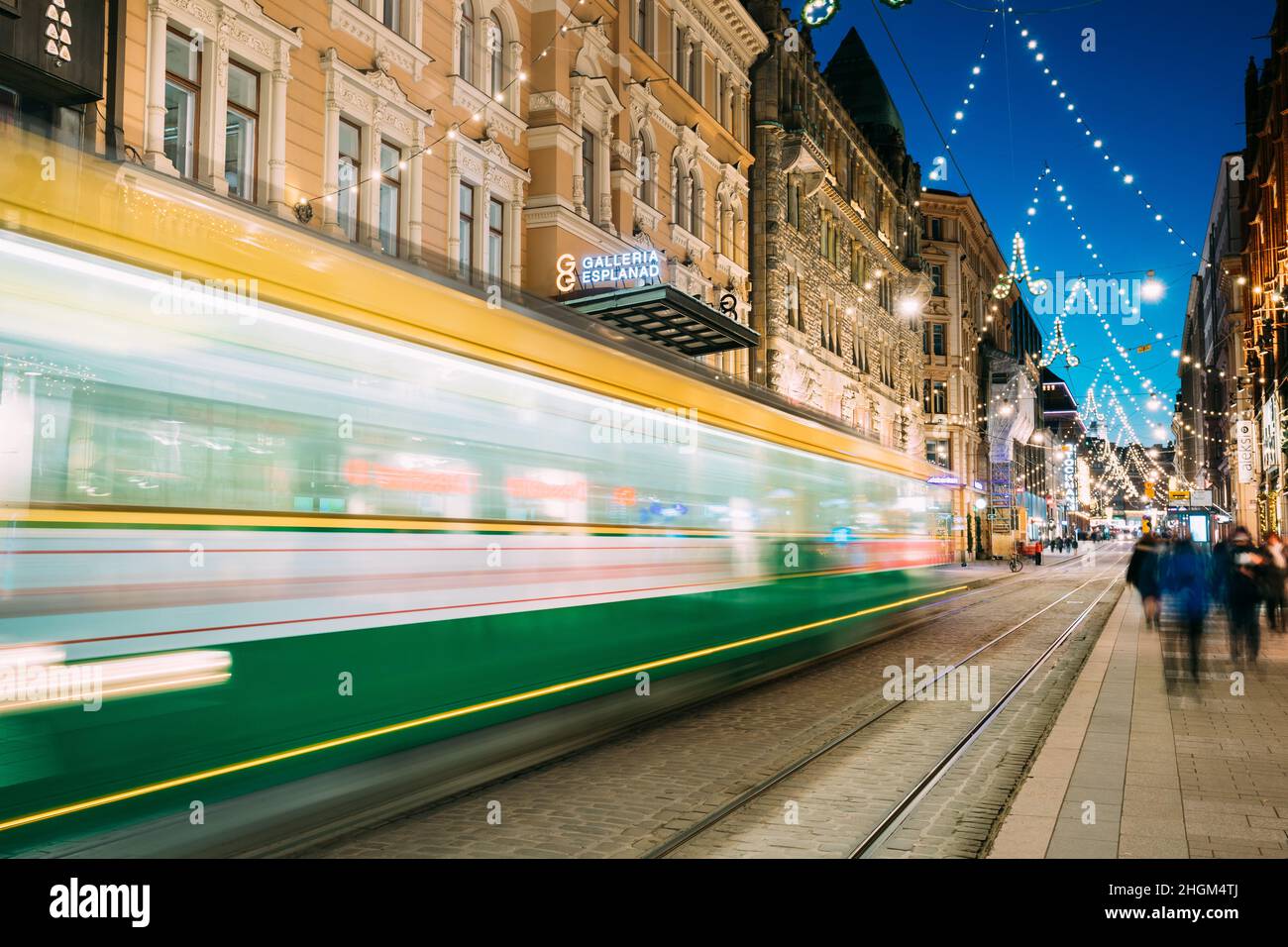 Helsinki, Finland. Tram Departs In Motion Blur From Stop On ...