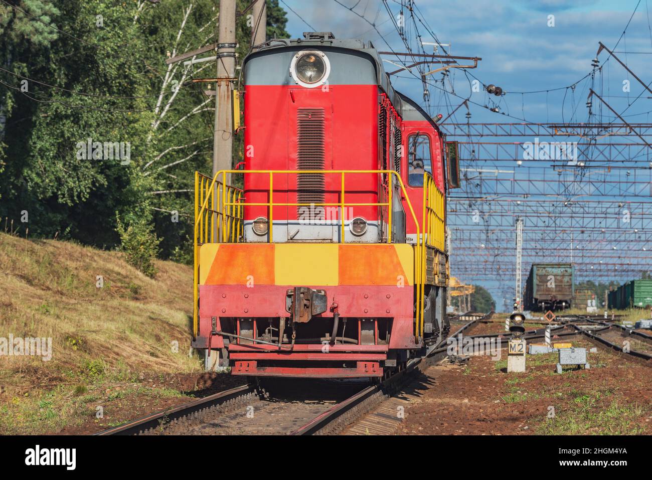Freight diesel locomotive arrives to the station Stock Photo - Alamy