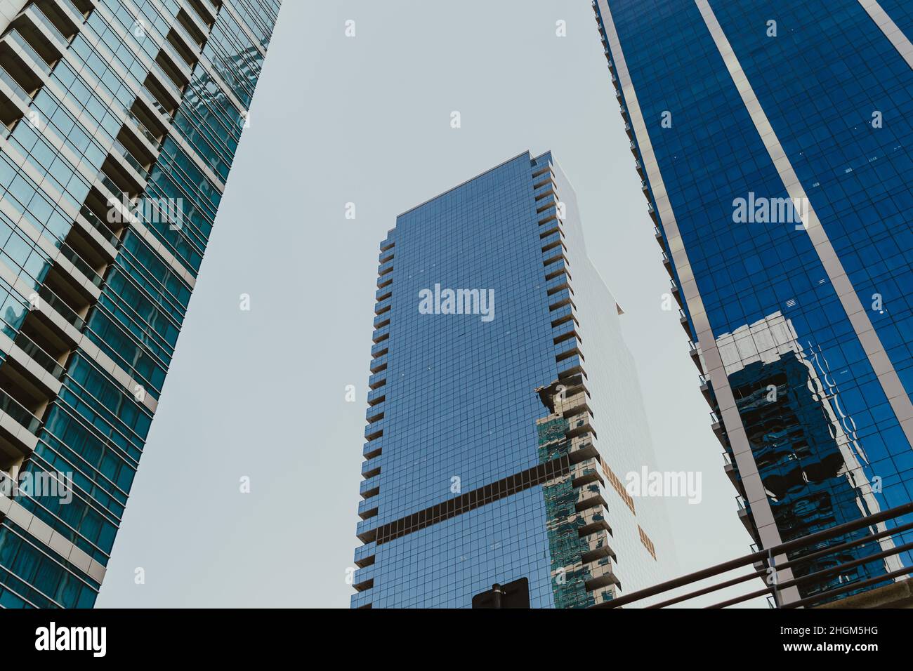 Daytime modern high tech glass skyscraper business tower and ...