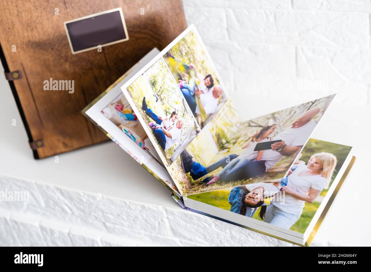 photo book with wooden cover. unfolded photobook. sample photobook ...