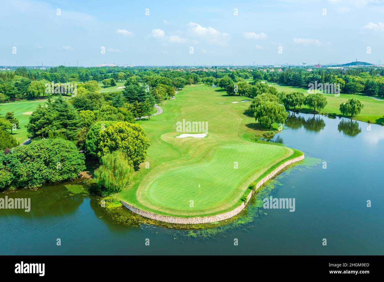 Aerial view of green lawn and forest on golf course.Green golf course ...