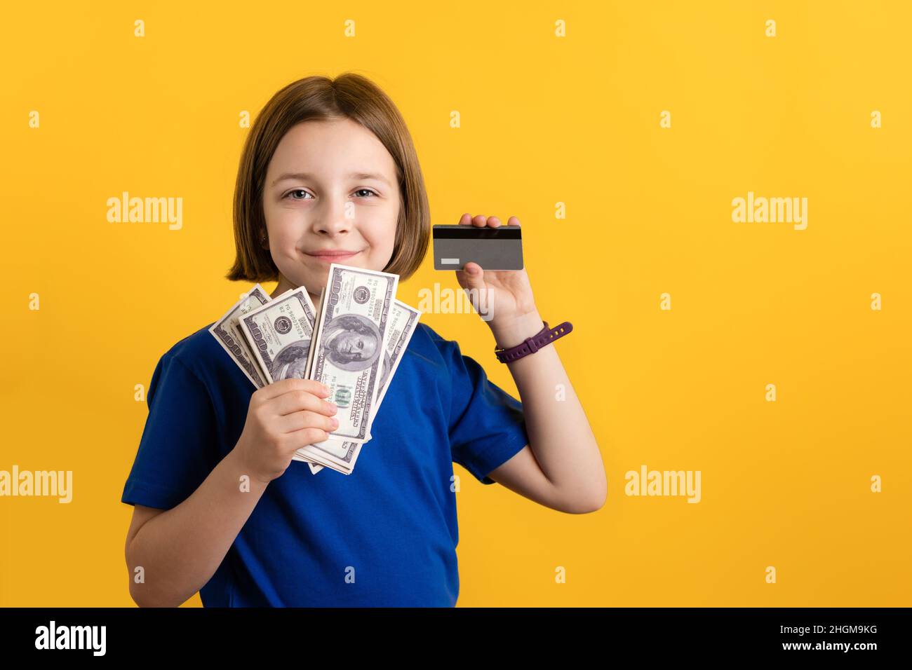 Successful Little Girl 8 10 Years Old In Basic Blue T shirt On Yellow Successful Little Girl 8 10 Years Old In Basic Blue T shirt On Yellow