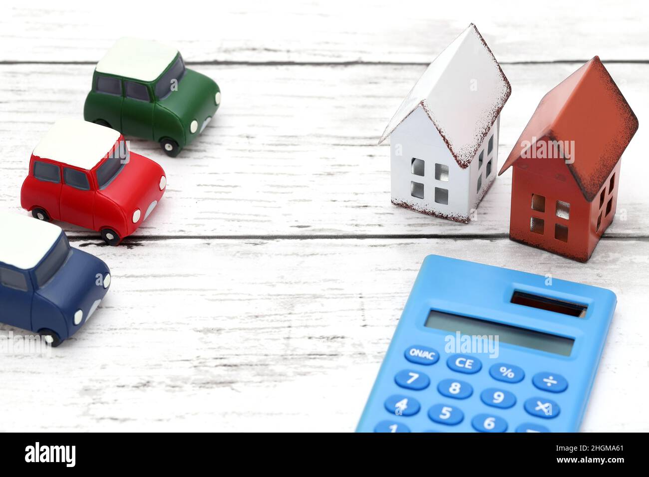 small toy car and wooden toy house on white background Stock Photo - Alamy