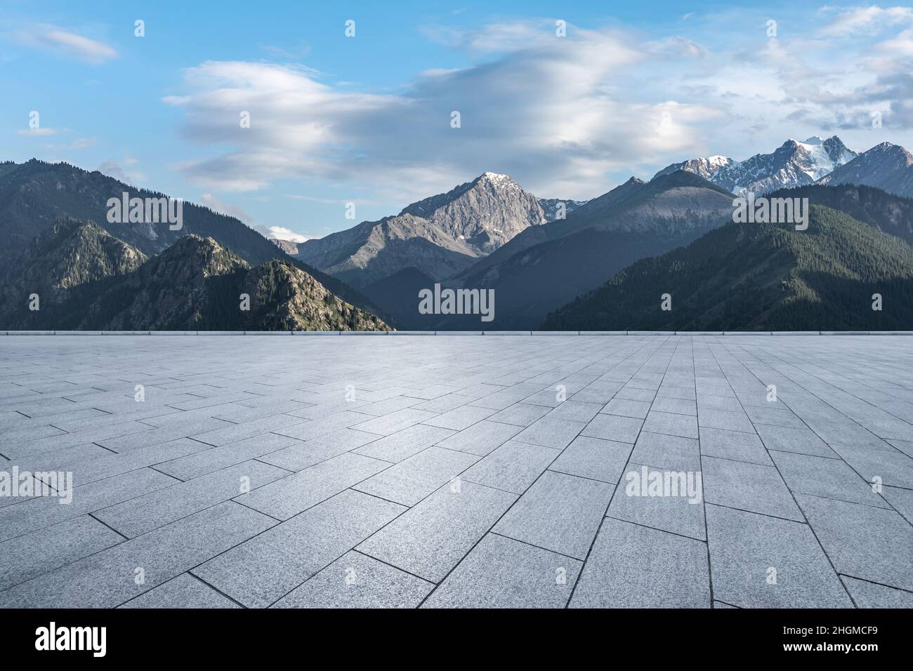 Empty square floor and snow mountain background Stock Photo - Alamy