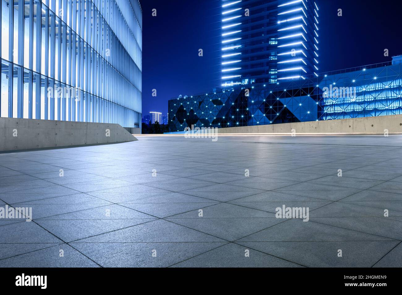 Empty square floor and city skyline with modern commercial buildings ...