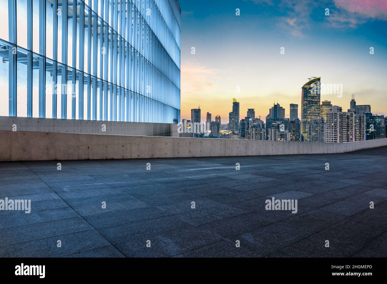 Panoramic skyline and modern commercial buildings with empty square ...