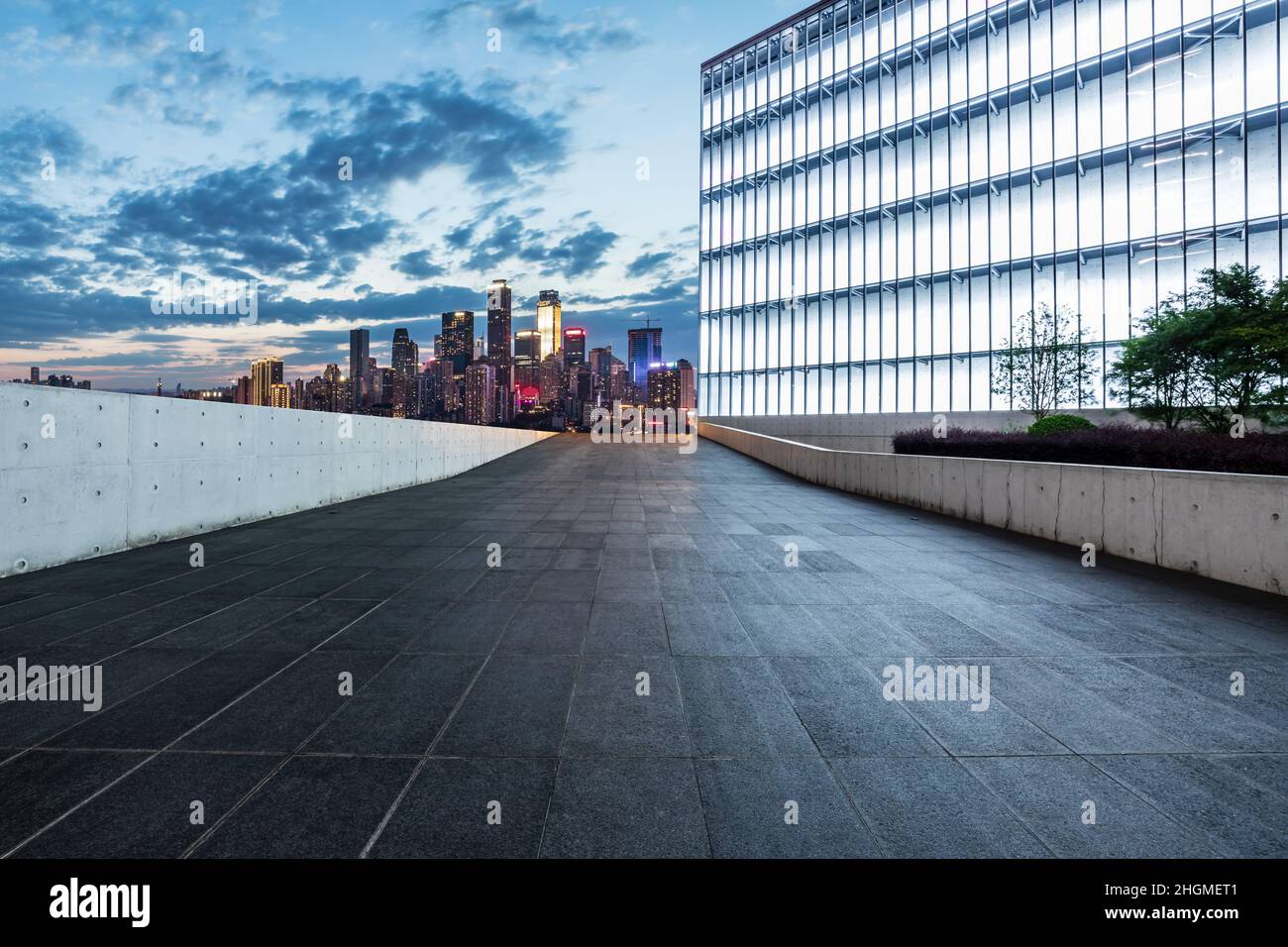 Empty square floor and city skyline with modern commercial buildings ...