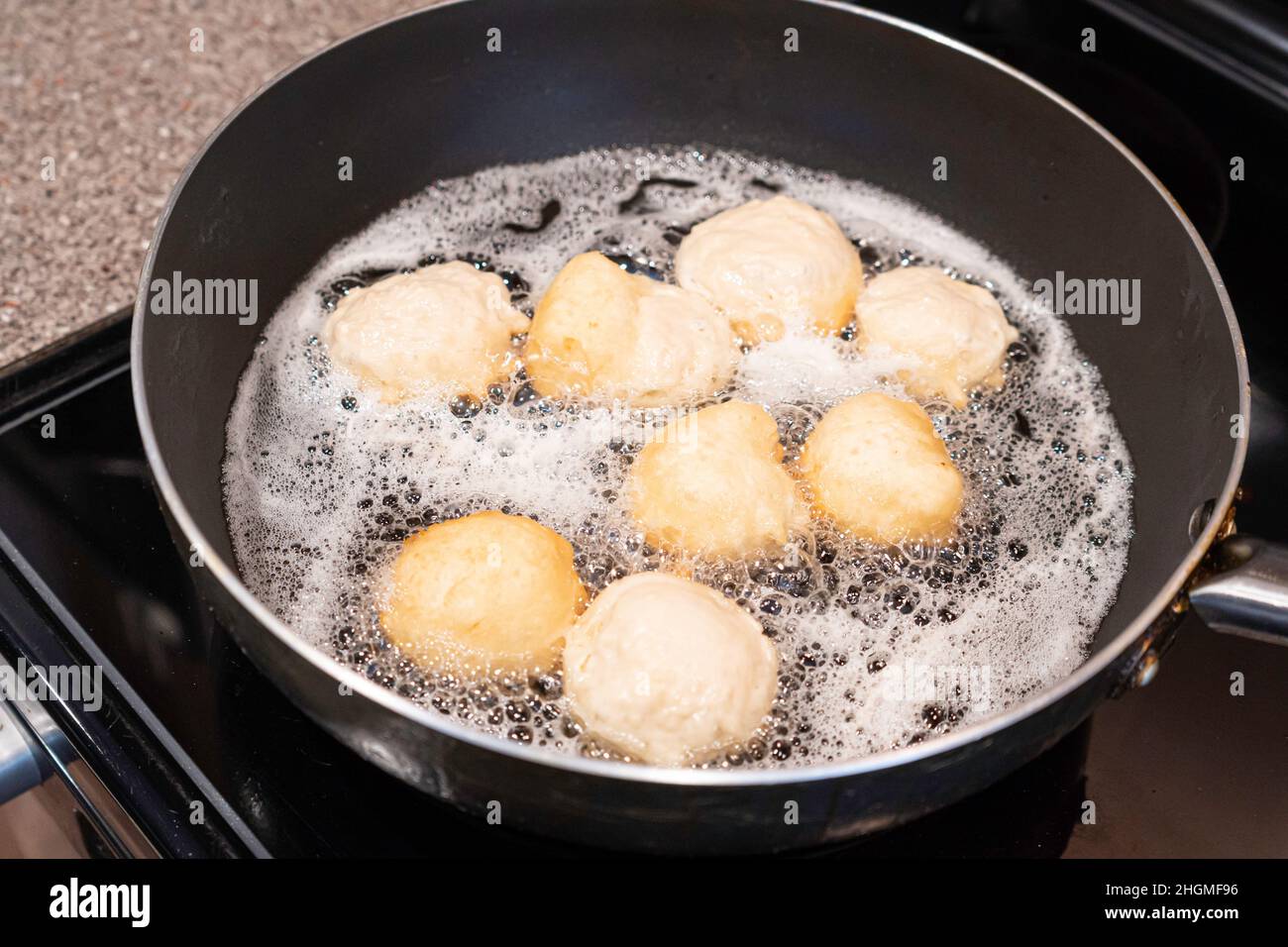 Deep fried Nigerian Buns ready to eat Stock Photo - Alamy