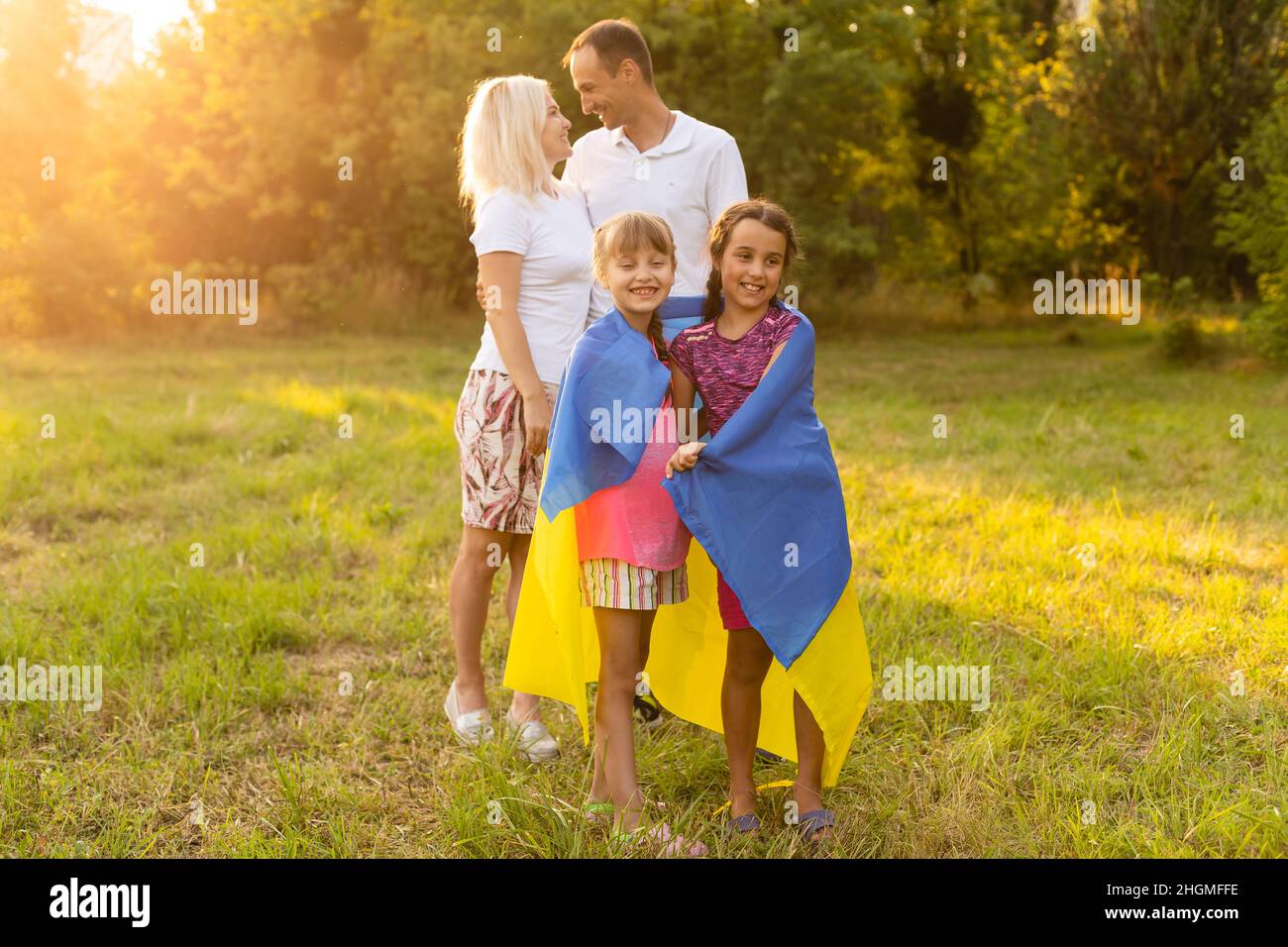 family with the flag of ukraine Stock Photo - Alamy
