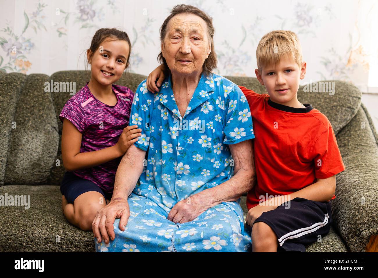 Grandmother with grandchild. Old woman with children Stock Photo - Alamy