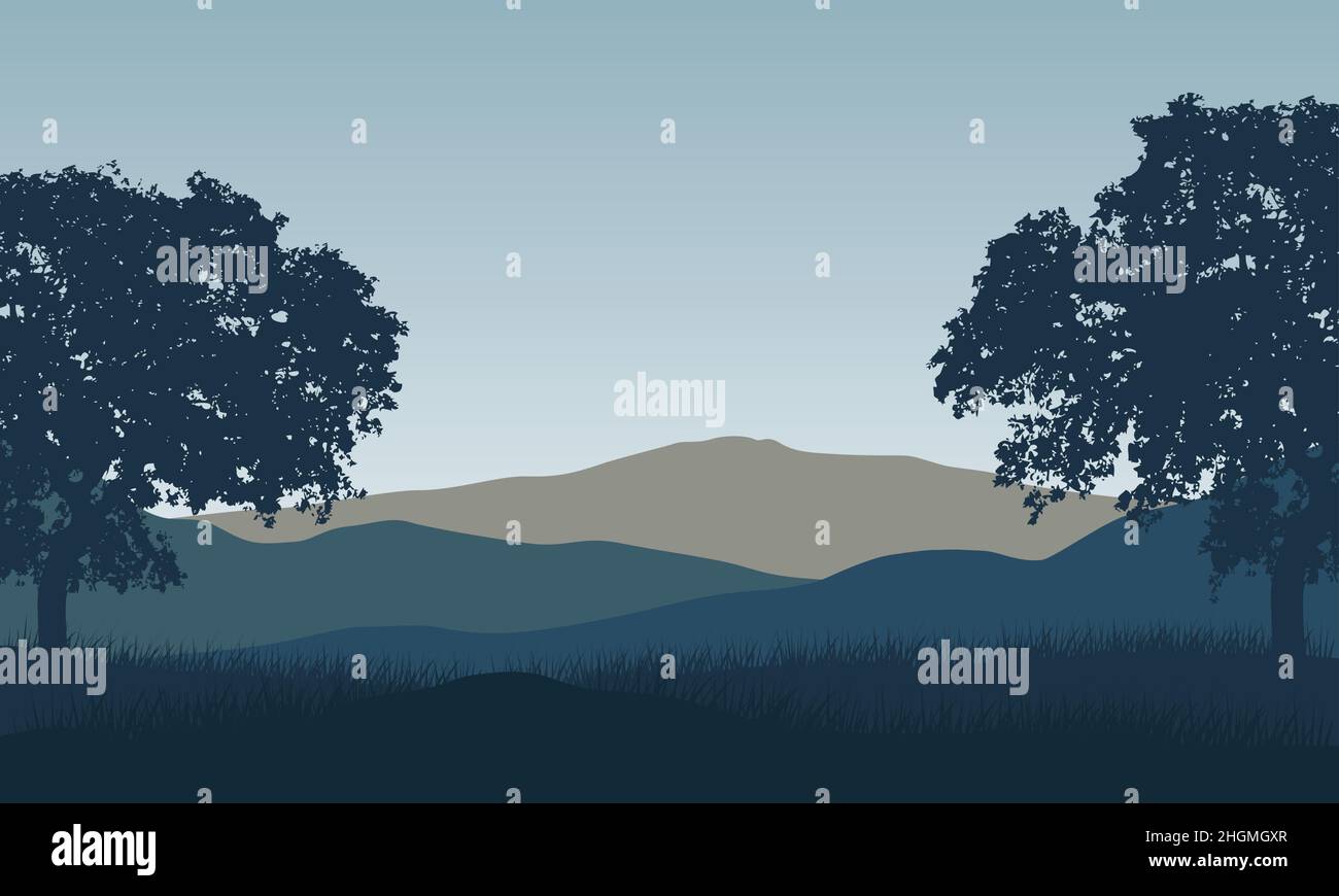 A fantastic mountain view with fir tree silhouettes from the edge of ...