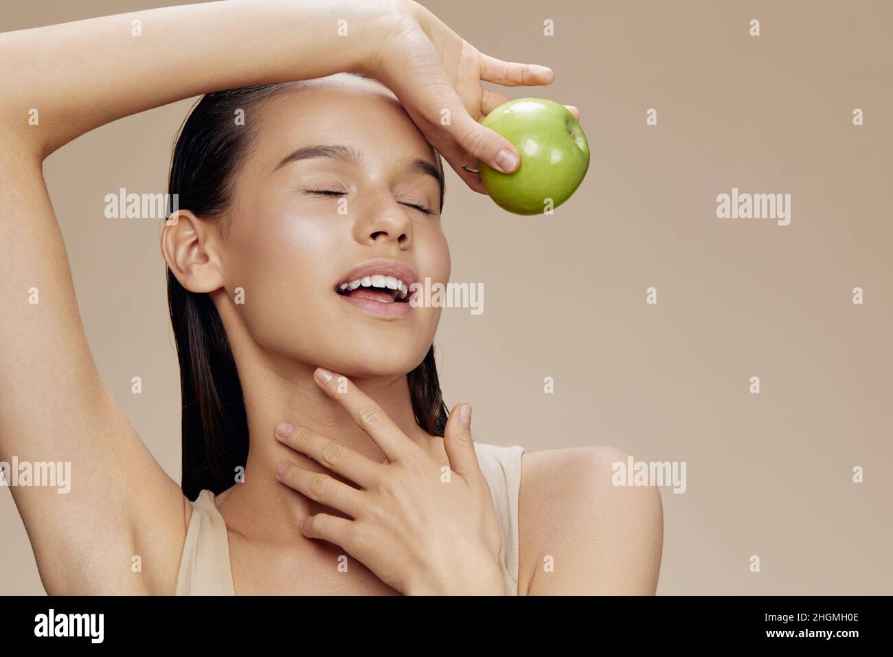 beautiful woman apple in hands posing fruit healthy food fresh beige ...