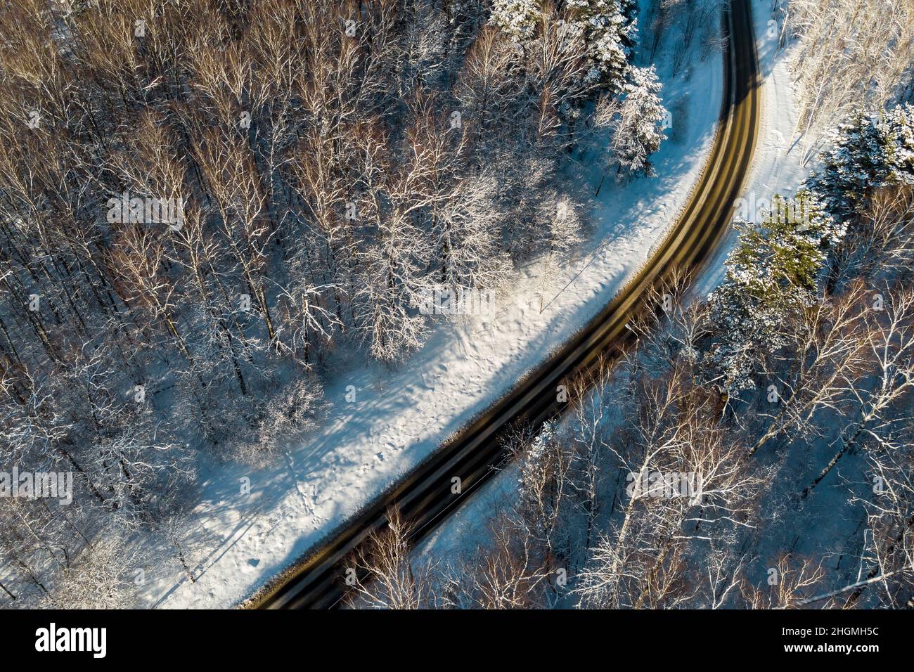 Aerial view through snowy forest hi-res stock photography and images ...
