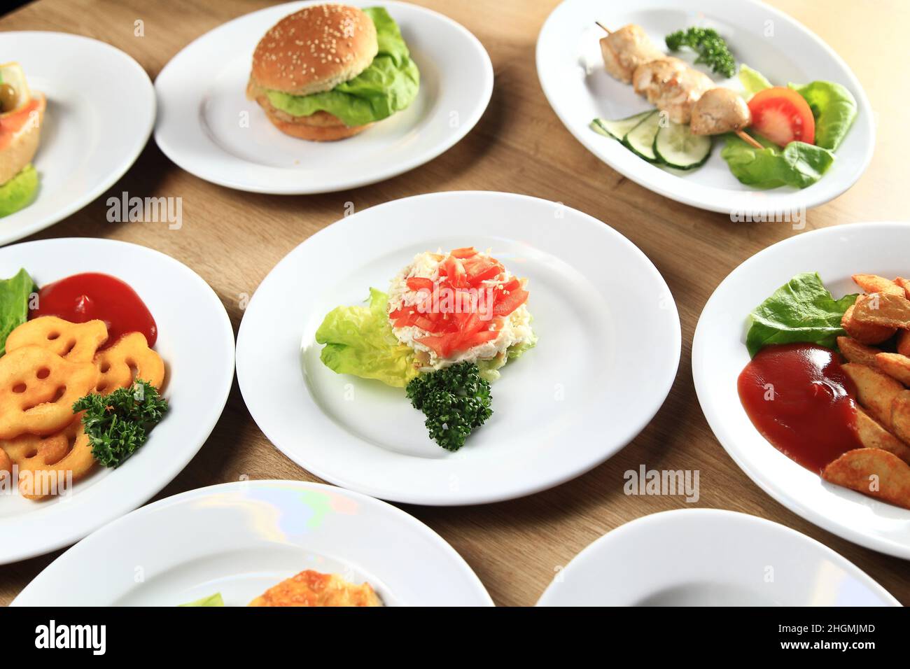 a variety of delicious dishes on the table in restaurant Stock Photo ...