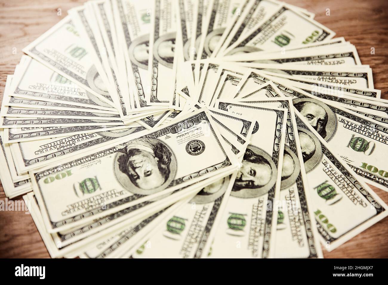 photo of banknotes of United States dollars on wooden background Stock ...