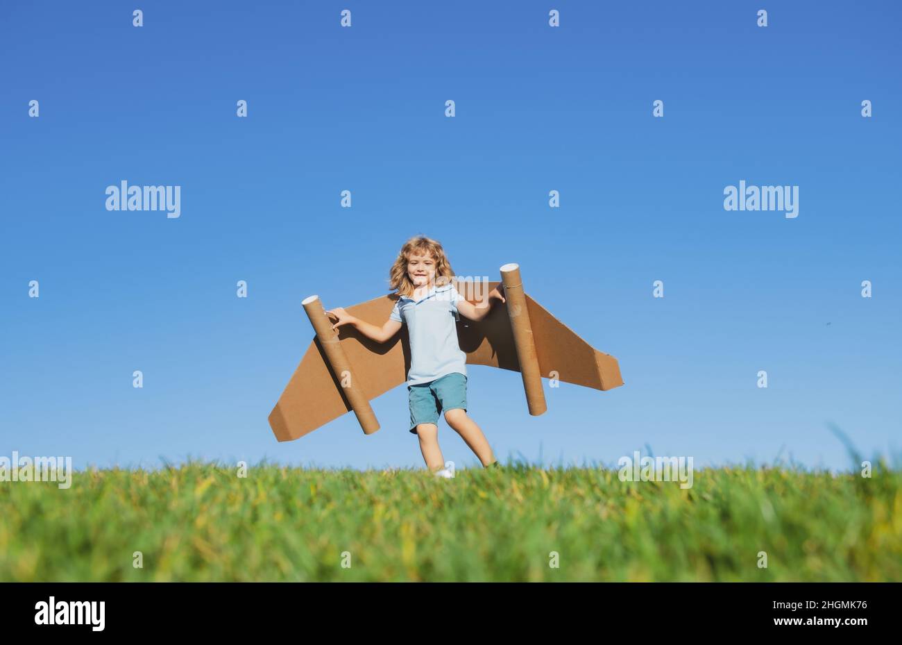 Boy child with wings at sky imagines a pilot and dreams of flying Stock ...