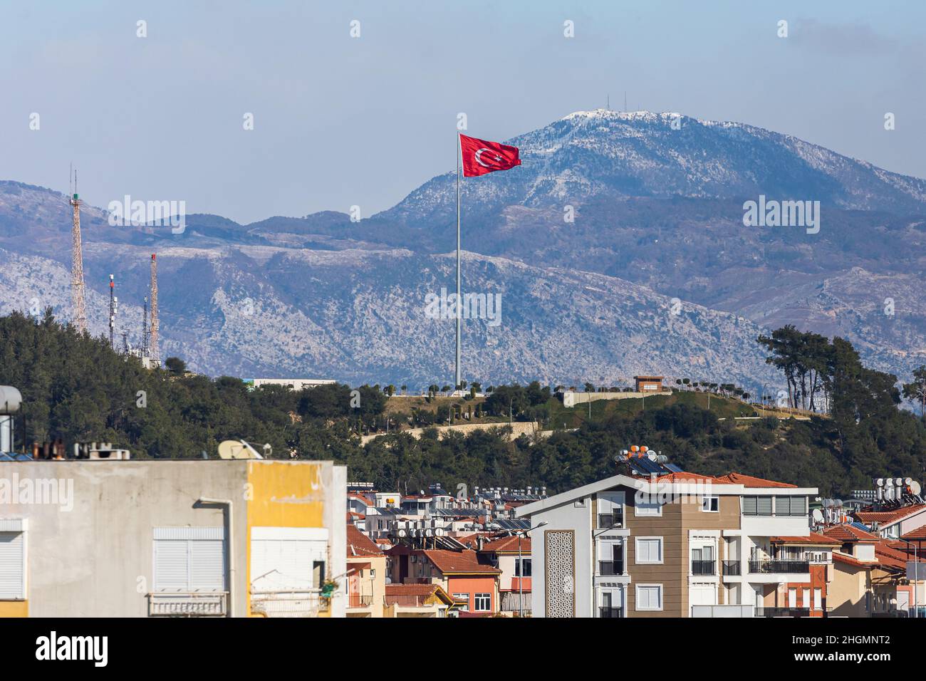 Colorful Turkish streets with low houses, barrels of hot water on the ...