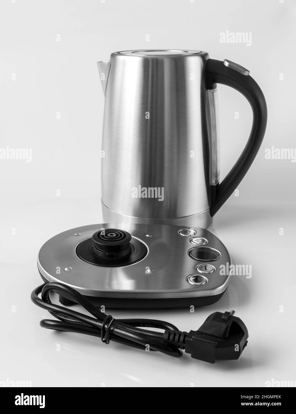 Metal electric kettle isolated on white background Stock Photo - Alamy